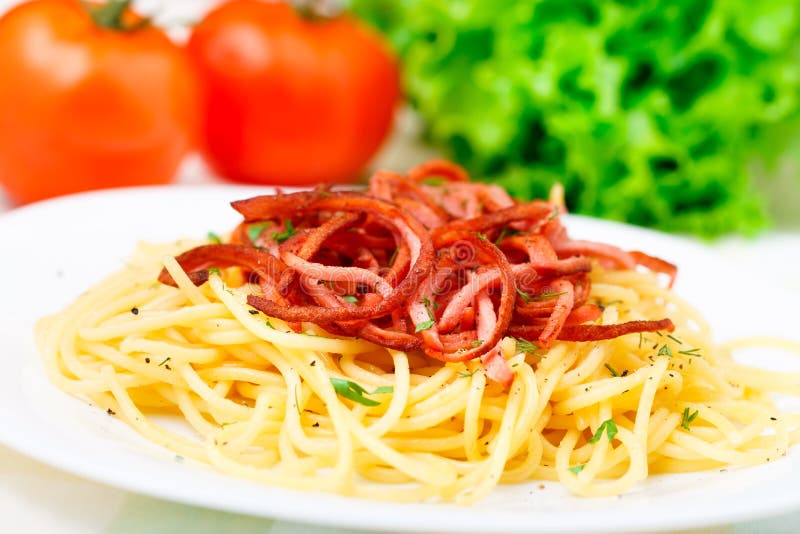Spaghetti with fried ham stock photo. Image of food, main - 34634546