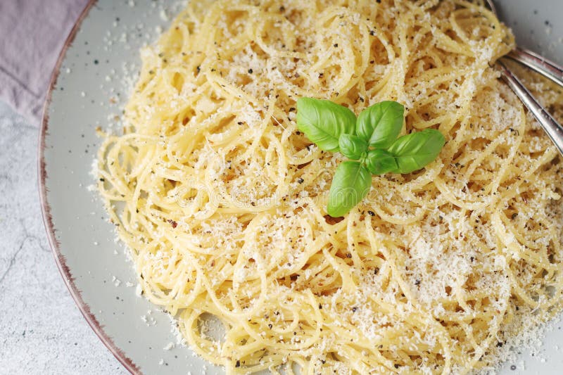 Spaghetti with Italian Cheese Pecorino Romano Stock Photo - Image of ...