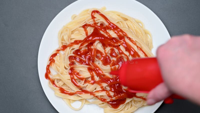 Spaghetti with ketchup stock footage. Video of prepare - 363458106