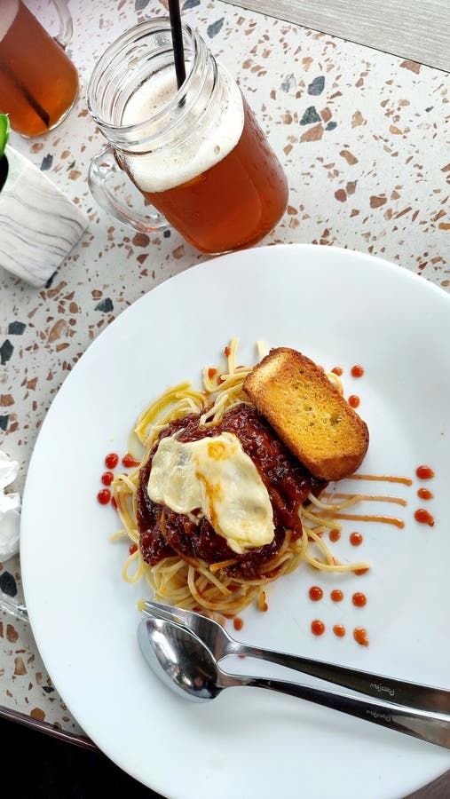 Spaghetti and lemon tea stock image. Image of delicious - 275177169