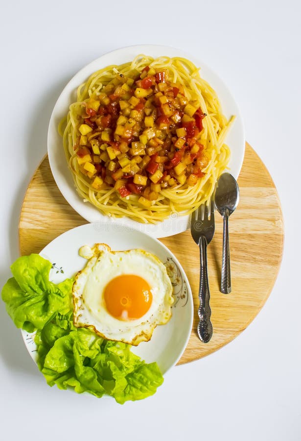 Spaghetti Pasta with Fried Eggs on Isolated White Background. Stock ... Spaghetti Pasta with Fried Eggs on Isolated White Background. Stock ...
