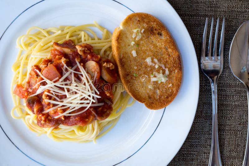 Spaghetti Pasta with Garlic Bread. Stock Photo - Image of eating, menu ...
