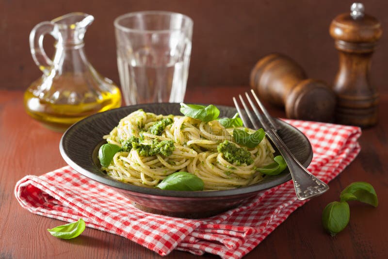 Spaghetti Pasta with Pesto Sauce Over Rustic Table Stock Photo - Image ...