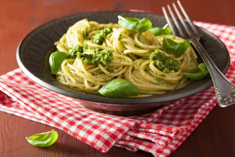 Spaghetti Pasta with Pesto Sauce Over Rustic Table Stock Photo - Image ...