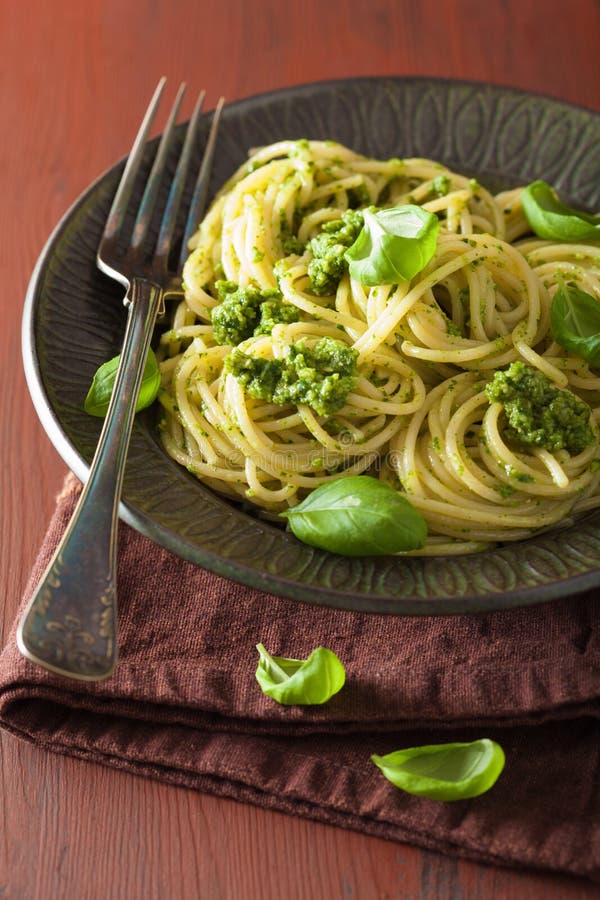 Spaghetti Pasta with Pesto Sauce Over Rustic Table Stock Photo - Image ...