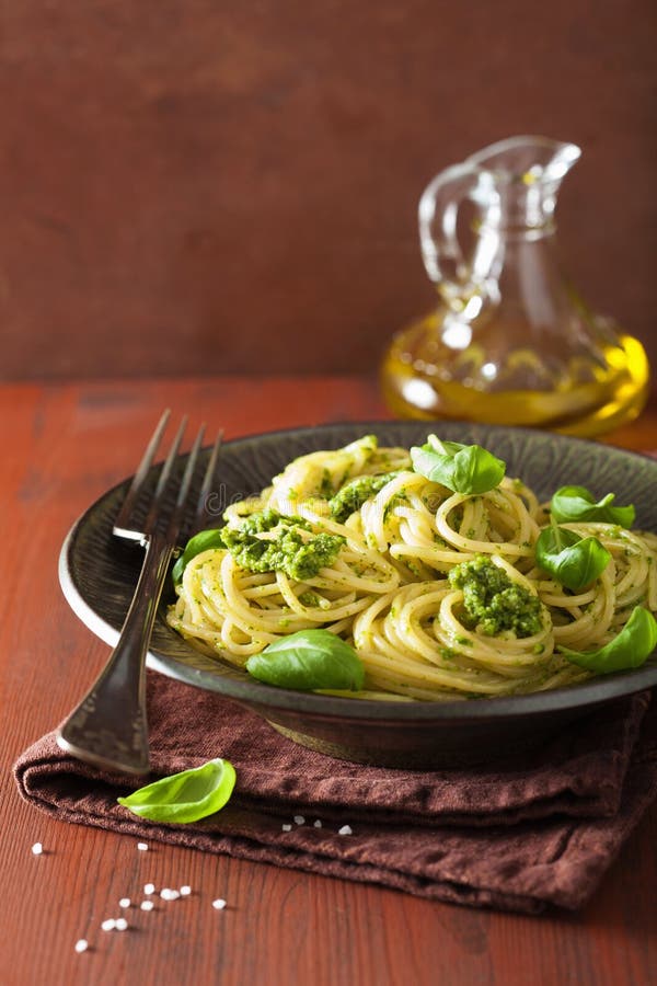 Spaghetti Pasta with Pesto Sauce Over Rustic Table Stock Image - Image ...