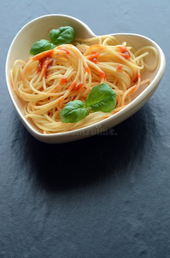 Spaghetti Pasta with Tomato Sauce and Garnish Stock Photo - Image of ...