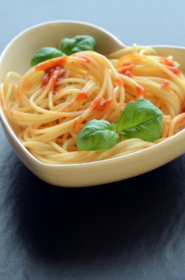 Spaghetti Pasta with Tomato Sauce and Garnish Stock Photo - Image of ...