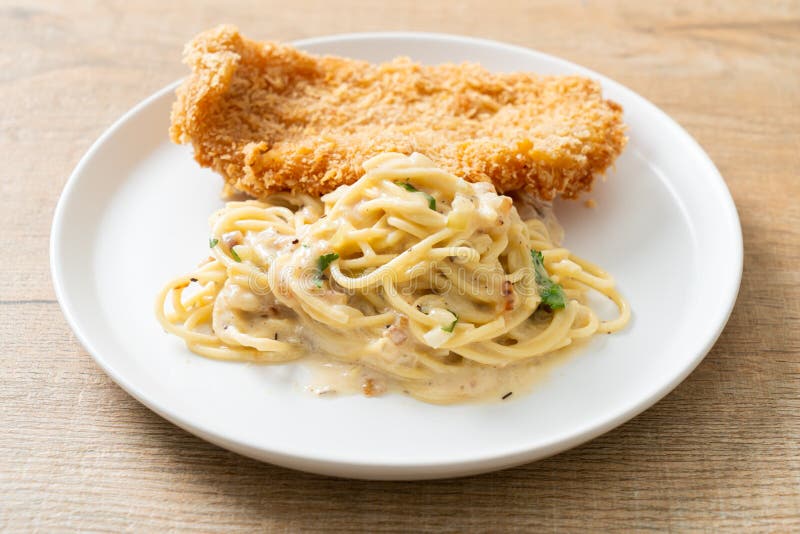 Spaghetti Pasta White Cream Sauce with Fried Fish Stock Image - Image ...