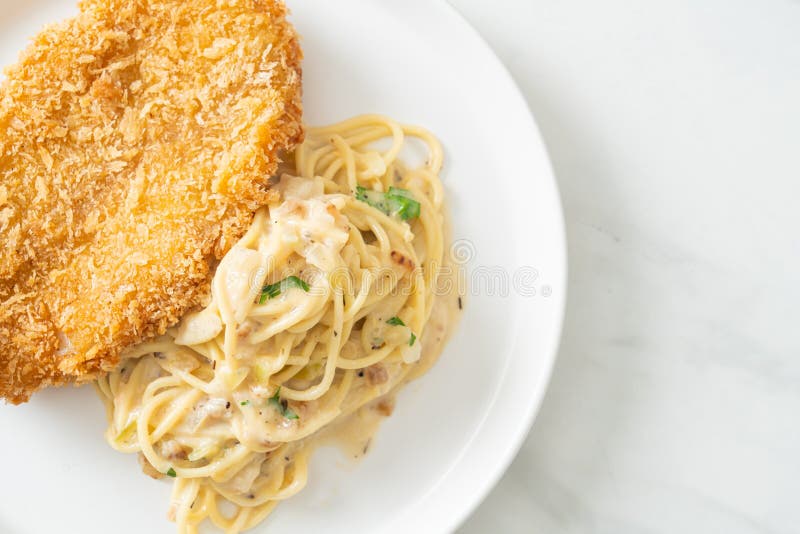 Spaghetti Pasta White Cream Sauce with Fried Fish Stock Photo - Image ...