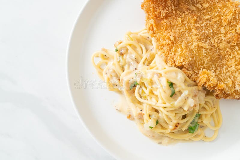 Spaghetti Pasta White Cream Sauce with Fried Fish Stock Photo - Image ...