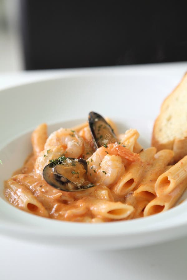 Spaghetti Penne with Seafood Stock Photo - Image of italian, closeup ...