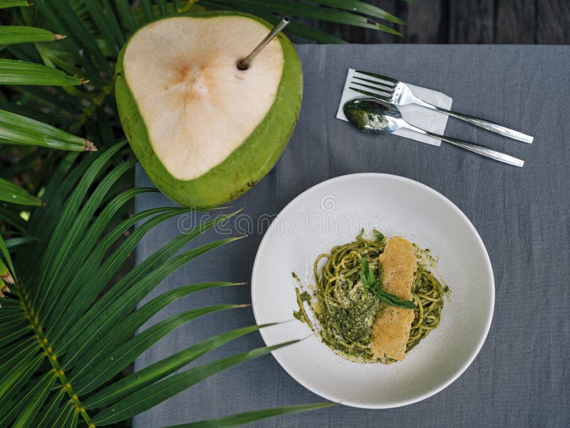 Pasta Pesto and Coconut on the Table Stock Photo - Image of tropical ...