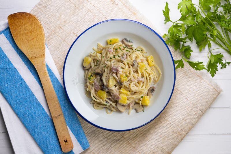 Spaghetti with Pineapple, Ham and Cream Sauce. Top View Table with ...
