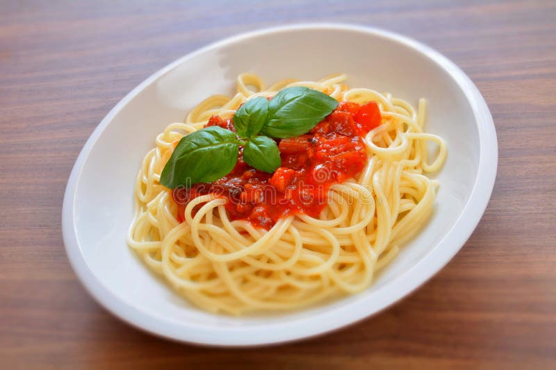 Spaghetti on a plate stock photo. Image of tomato, sauce - 314258940