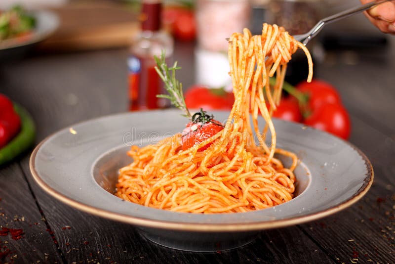 Spaghetti round the fork stock image. Image of wheat - 214477855