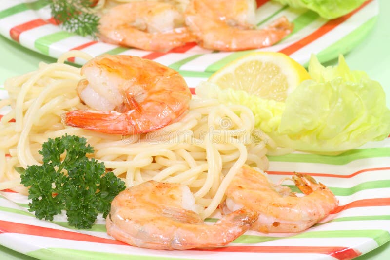Spaghetti with scampi stock photo. Image of cooking, dinner - 12747522