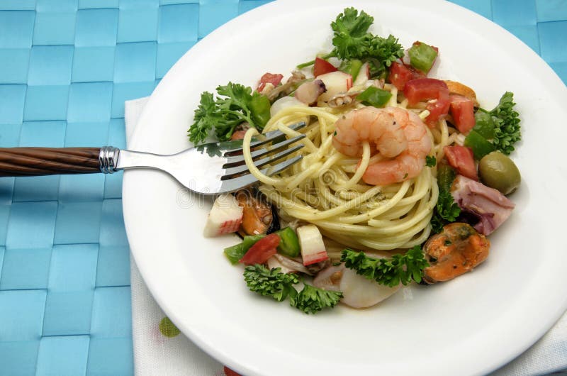 Spaghetti with seafood stock image. Image of lunch, salad - 259030749