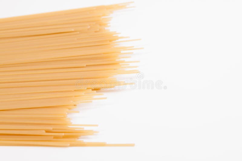 Spaghetti Spread Out on a White Surface Stock Photo - Image of ...