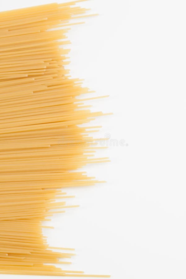 Spaghetti Spread Out on a White Surface Stock Photo - Image of texture ...