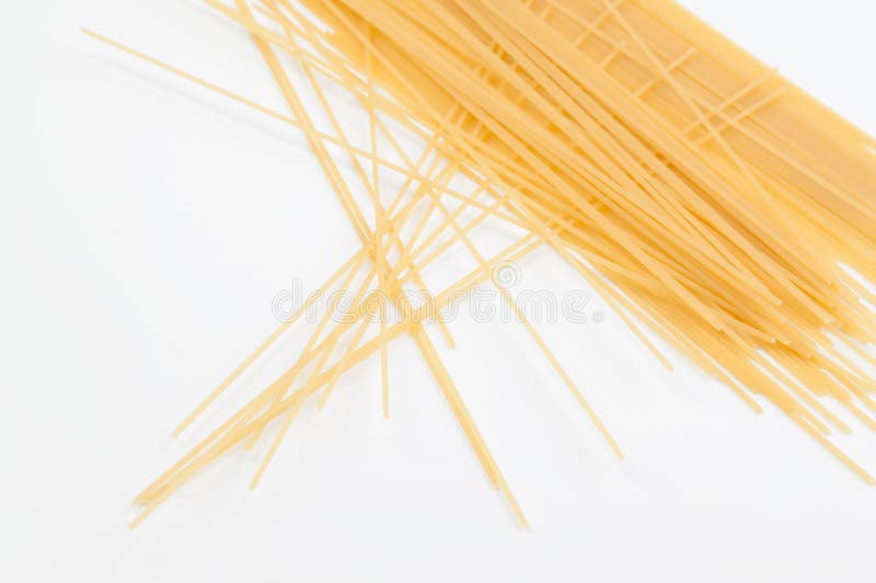 Spaghetti Spread Out on a White Surface Stock Image - Image of ...