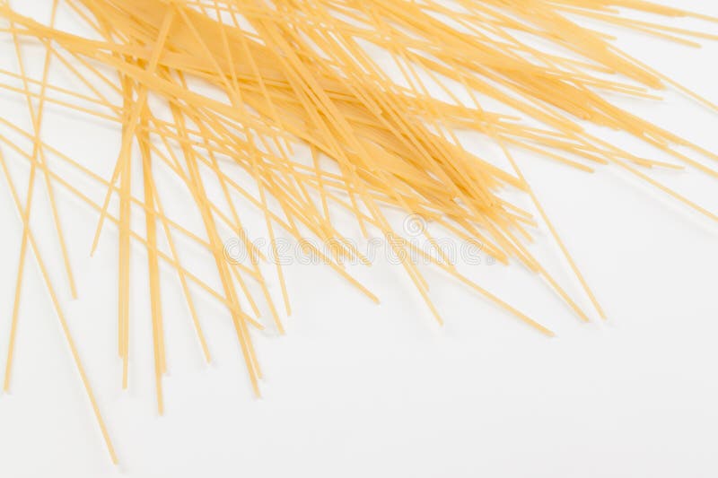 Spaghetti Spread Out on a White Surface Stock Photo - Image of meal ...