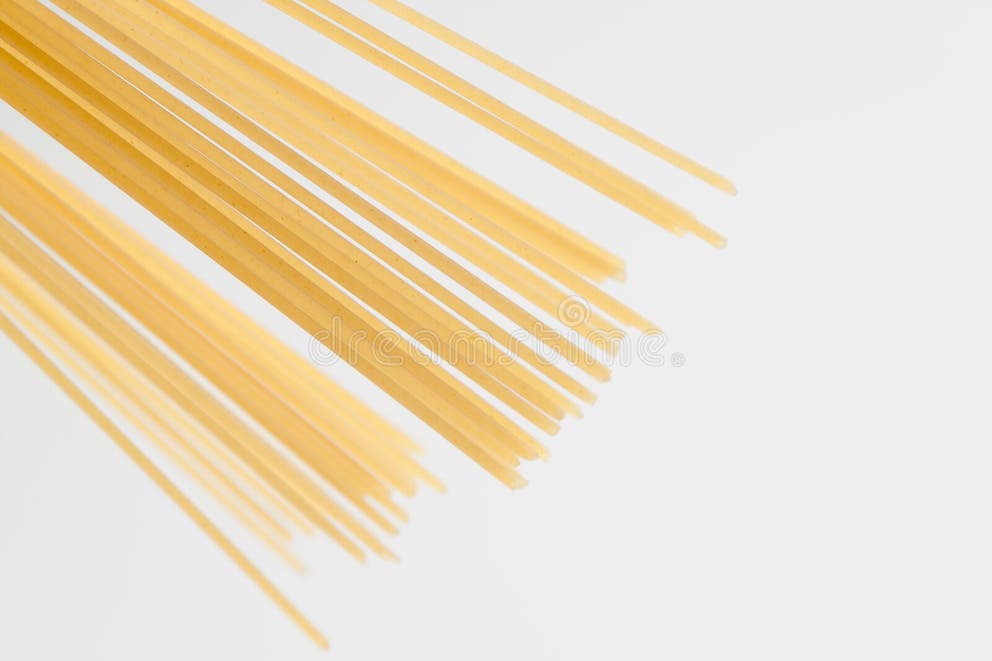 Spaghetti Spread Out on a White Surface Stock Photo - Image of healthy ...