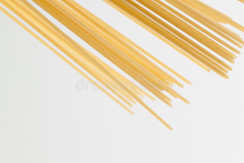 Spaghetti Spread Out on a White Surface Stock Photo - Image of ...