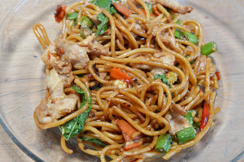 Spaghetti Stir Fried with Spicy Pork Stock Image - Image of style, meal ...
