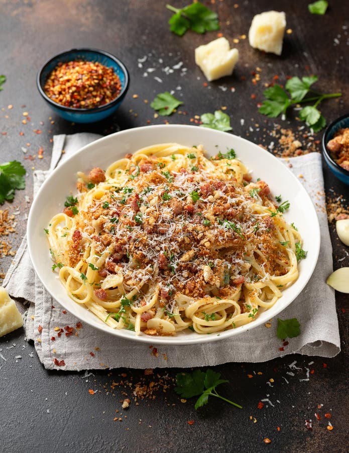 Spaghetti with Toasted Breadcrumbs, Bacon and Parmesan Cheese. Stock ...