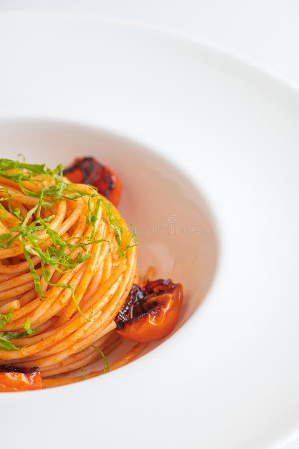 Spaghetti with Tomato Sauce and Burned Tomatos Stock Photo - Image of ...
