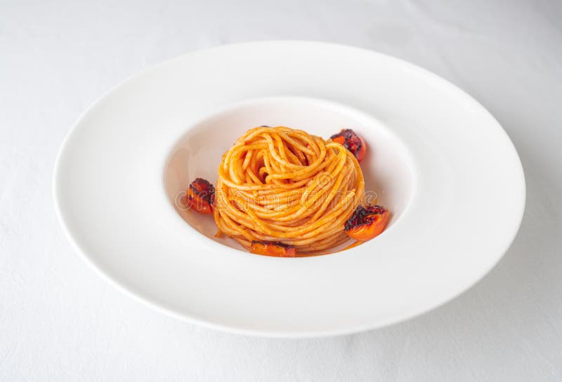 Spaghetti with Tomato Sauce and Burned Tomatos Stock Photo - Image of ...