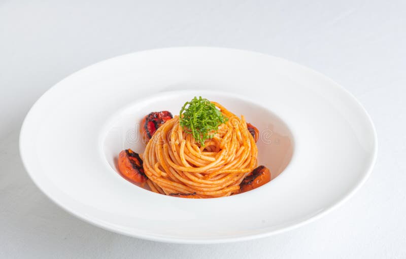 Spaghetti with Tomato Sauce and Burned Tomatos Stock Photo - Image of ...