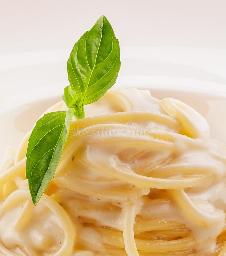 Spaghetti with White Cream Sauce on White Stock Photo - Image of ...