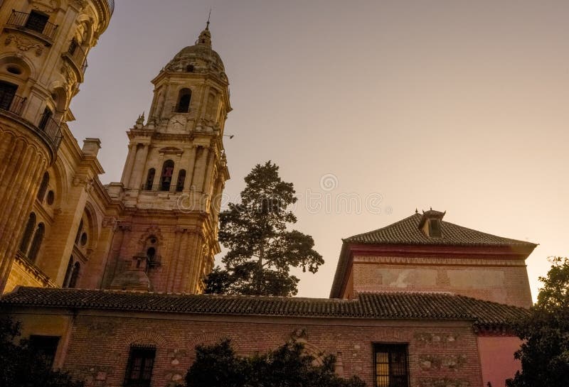 Spain, Malaga, a Clock Tower in the Dark Stock Photo - Image of dusk ...