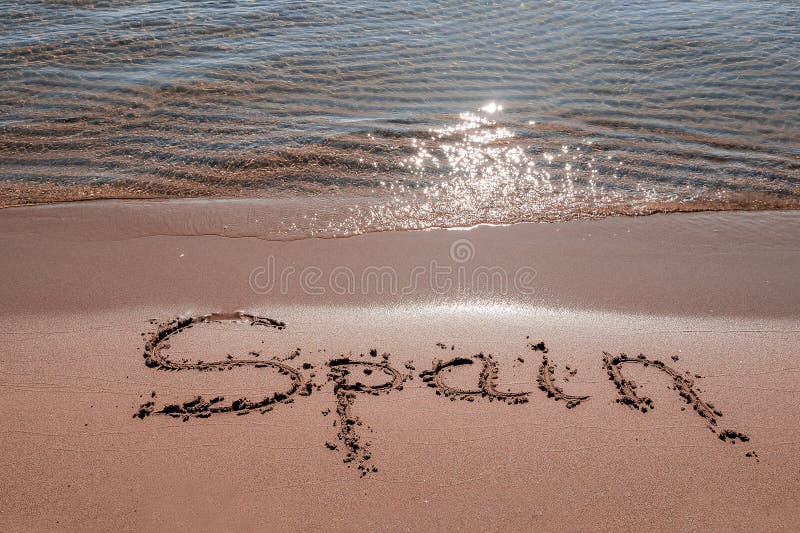 Spain Title on the Sand Beach Near the Ocean Stock Image - Image of ...