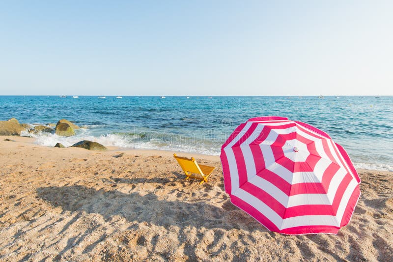Spanish beach stock photo. Image of beach, chair, travel - 55384504