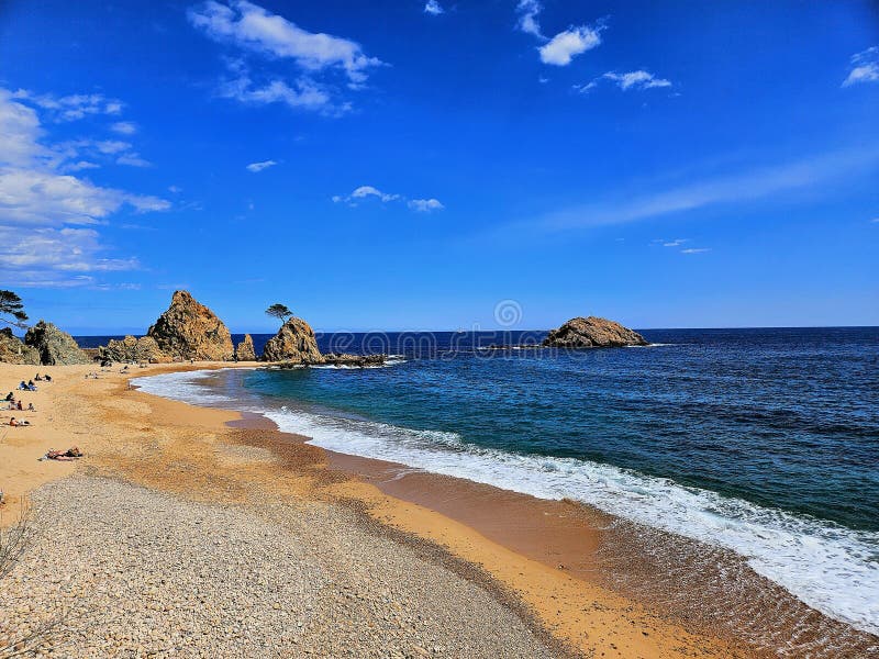 Spanish beach with rocks stock photo. Image of cape - 339533566