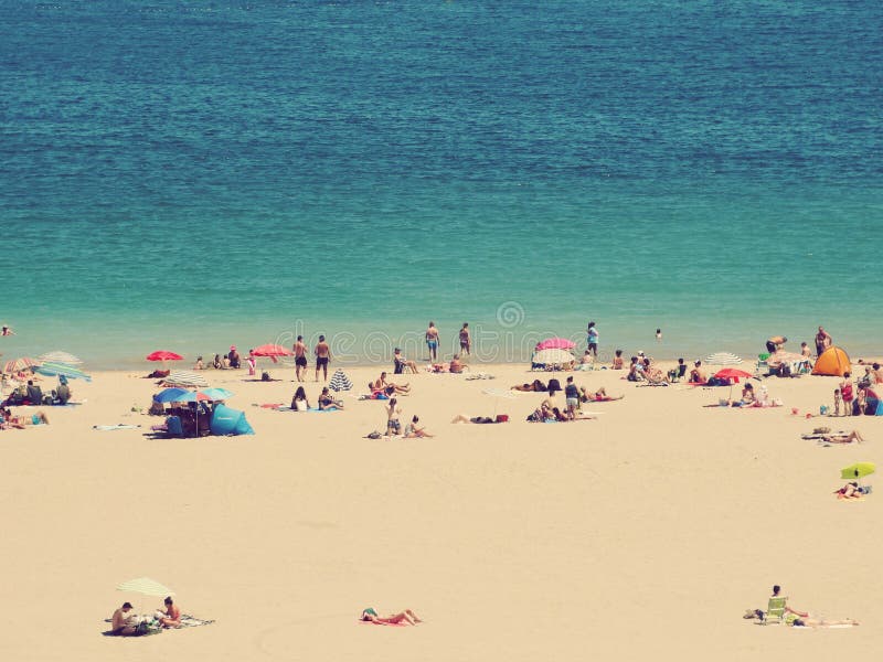 Spanish Beach on Sunny Day editorial stock photo. Image of people ...