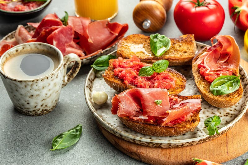 Spanish Breakfast. Tostada with Ripe Tomato and Ham Jamon with Coffee ...