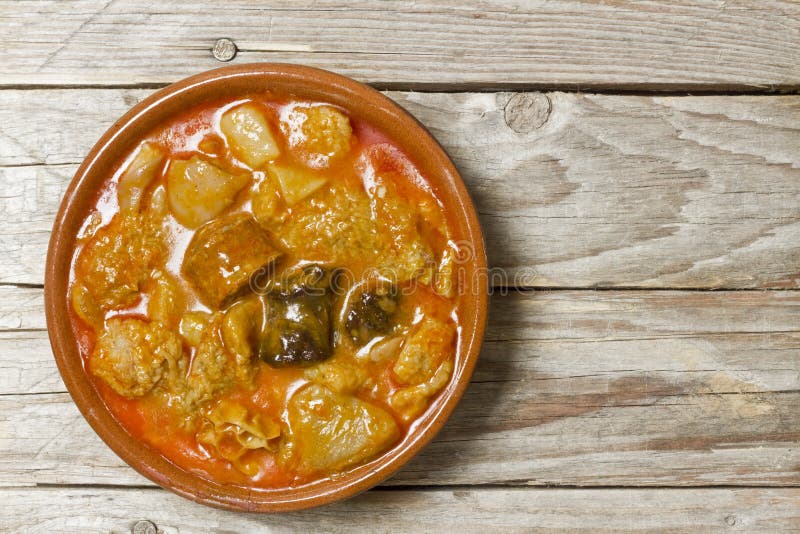 Spanish Callos in an Earthenware Dish on a Wooden Table Stock Image ...