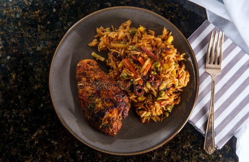 Spanish Chicken and Rice stock image. Image of coriander - 223658993