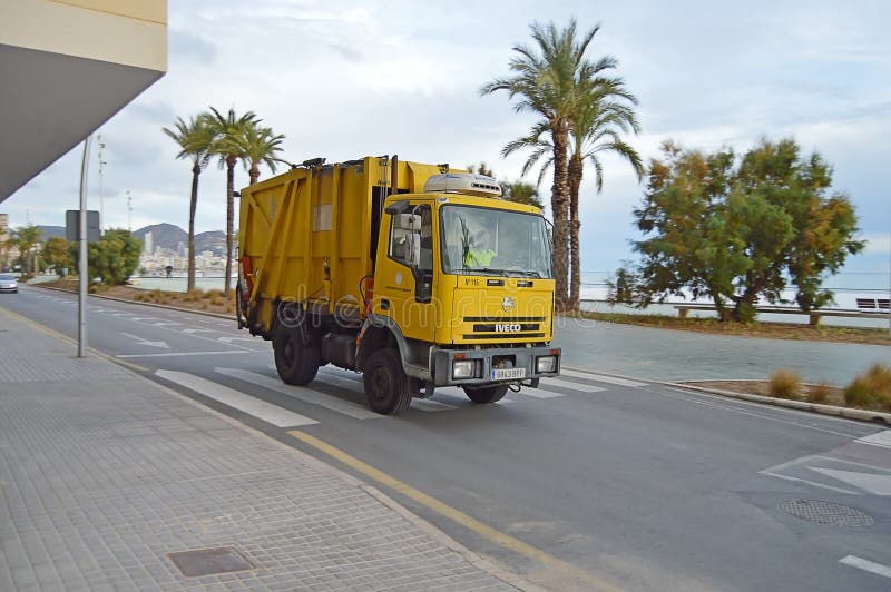 A Spanish Dustcart - Yellow Dustbin Lorry Refuge Collection Editorial ...
