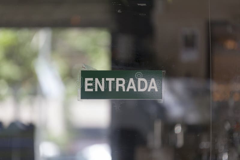 Spanish enter sign stock image. Image of close, defocused - 283015929