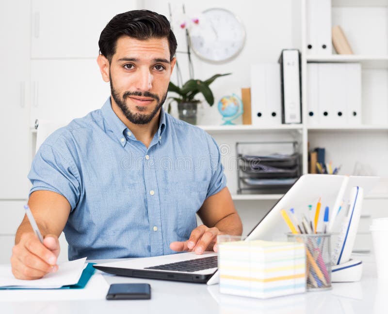 Spanish Man is Working with Documents in Laptop Stock Image - Image of ...