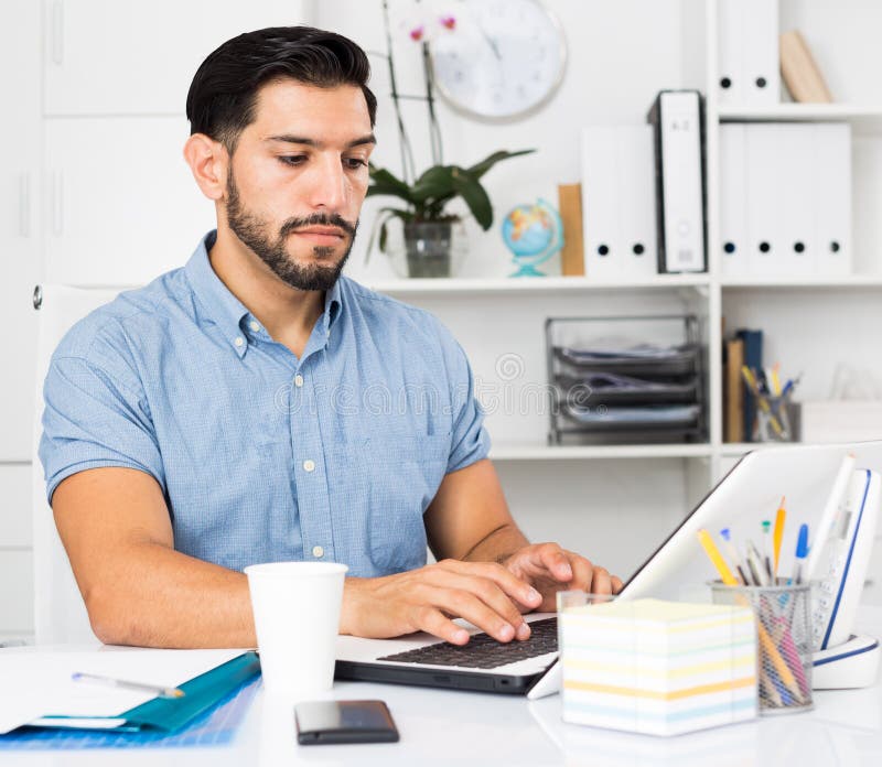Spanish Man is Working with Documents in Laptop Stock Image - Image of ...