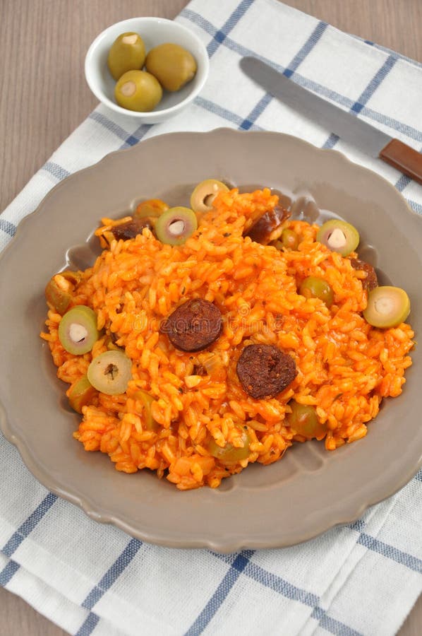 Risotto with Tomatoes, Olives and Chorizo Stock Image - Image of olives ...