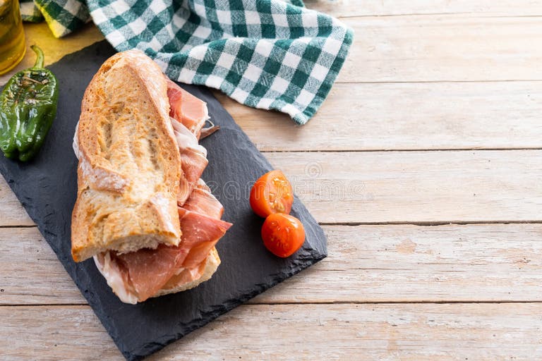 Spanish Serrano Ham Sandwich. Spanish Bocadillo De Jamon Serrano Stock ...