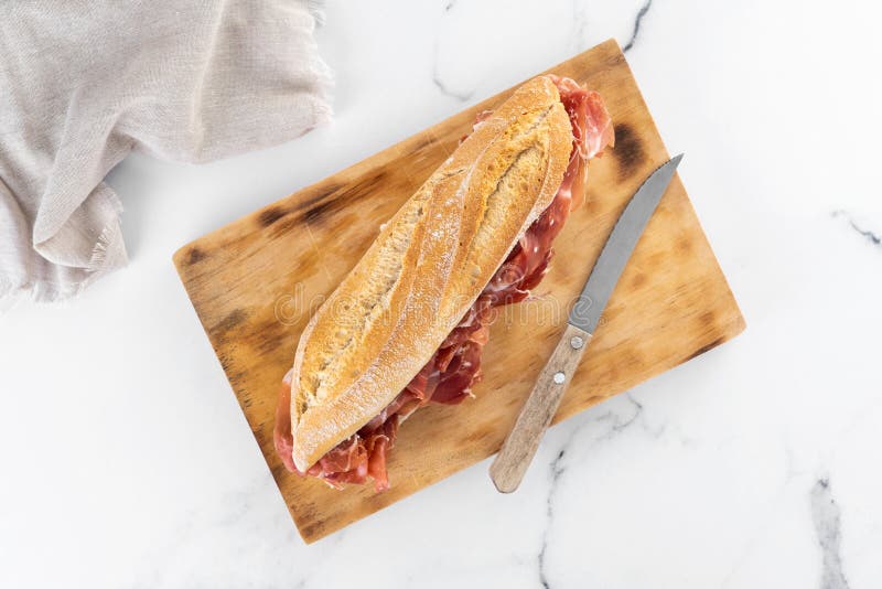 Spanish Serrano Ham Sandwich on White Marble Background Stock Image ...
