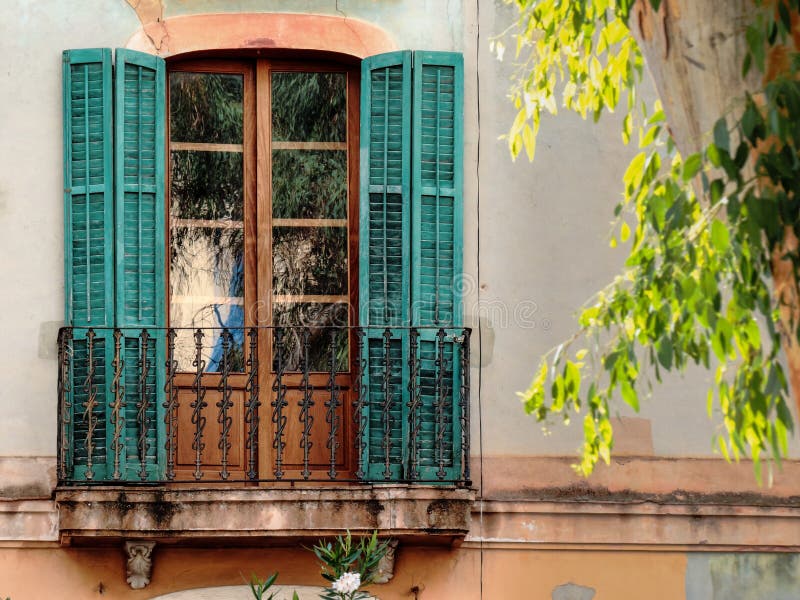 A Spanish Shuttered Window with Balcony Stock Image - Image of ...